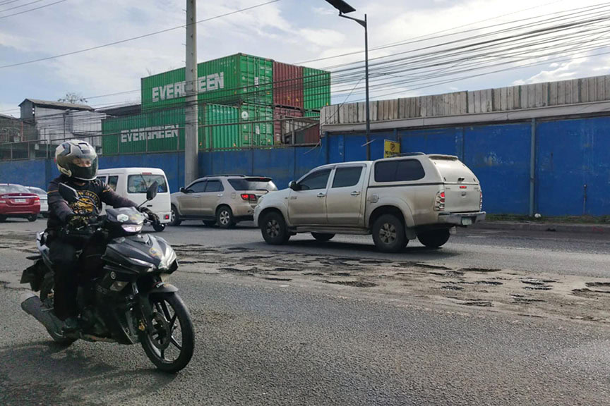 Davao Residents Decry Hazardous Potholes on Local Highway - Philippine ...